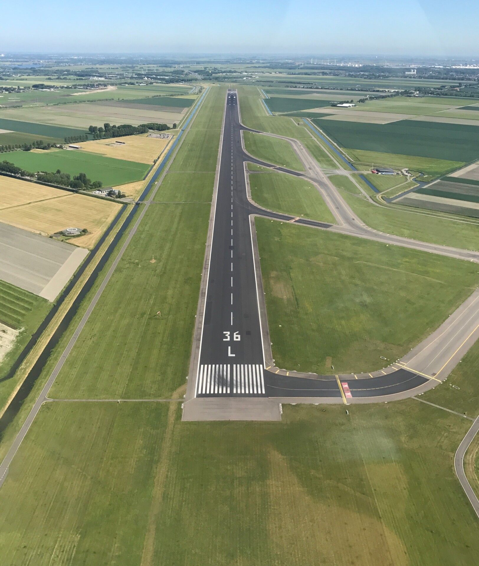 Which Airport's Runways Are Furthest From The Terminal?
