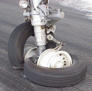 How Do Pilots Handle Burst Tire Incidents?